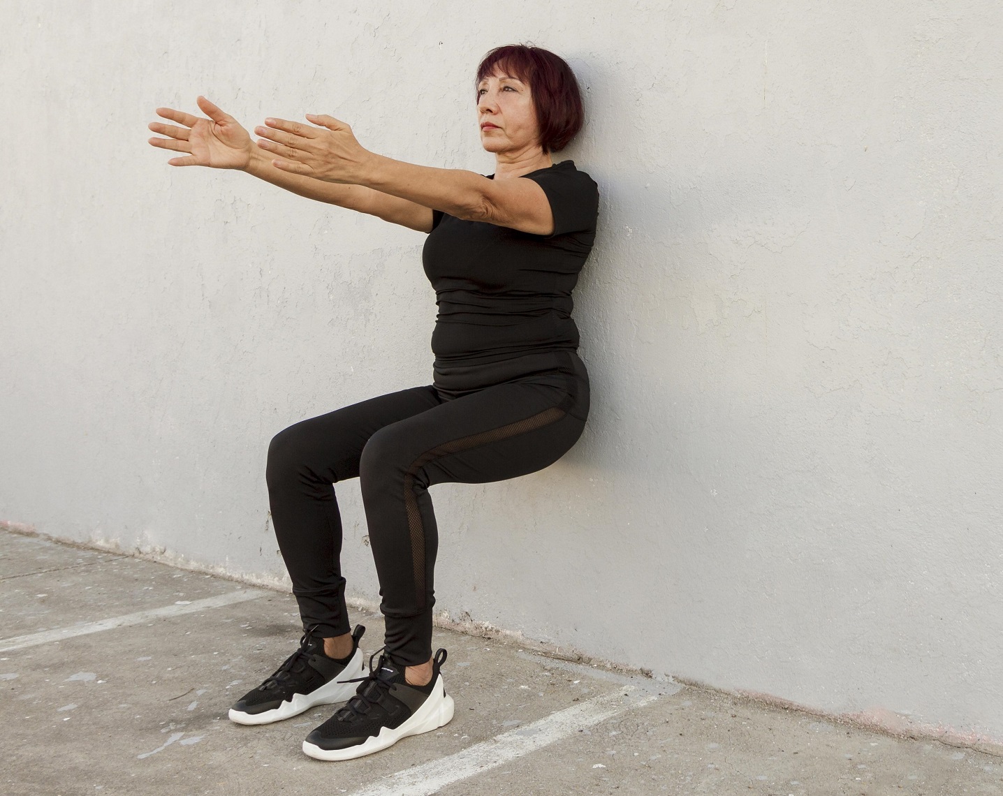 Wall Squats: Ultimate Training Guide - The Barbell